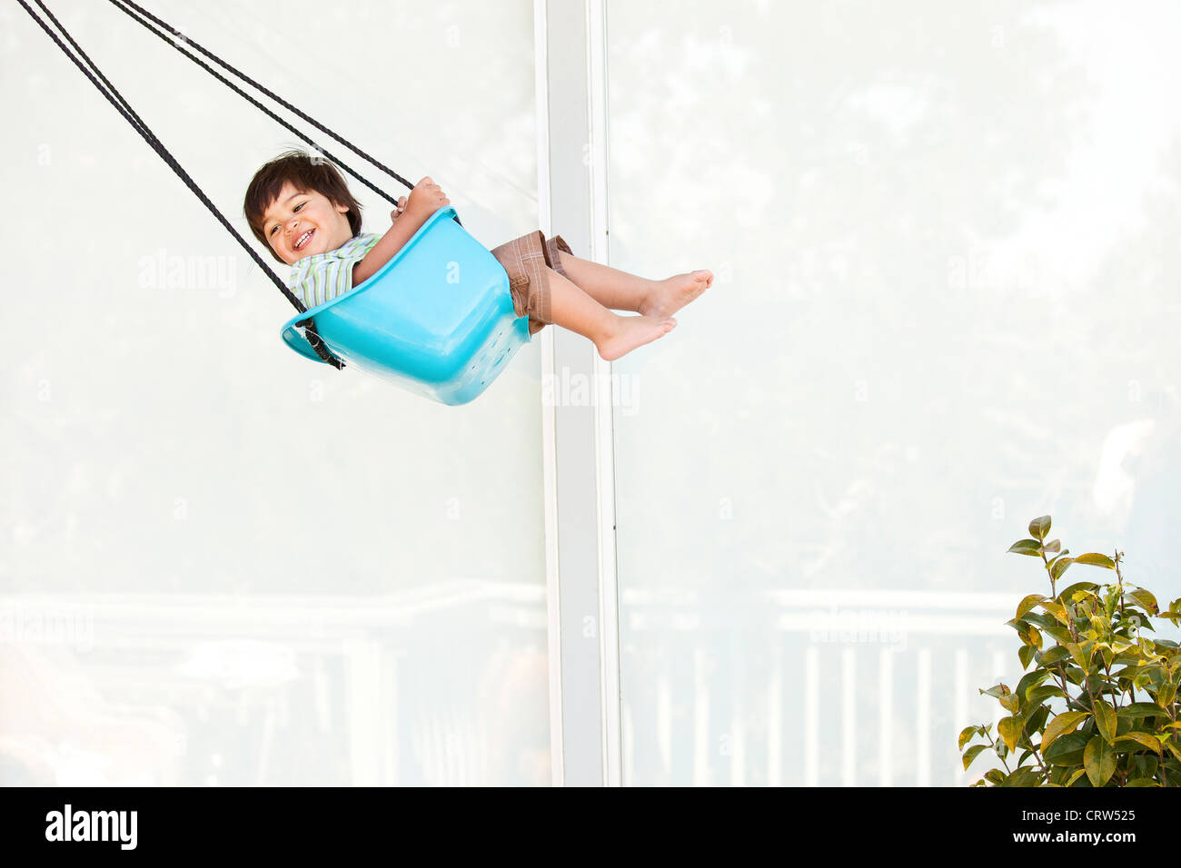 Holding onto swing hi-res stock photography and images - Alamy