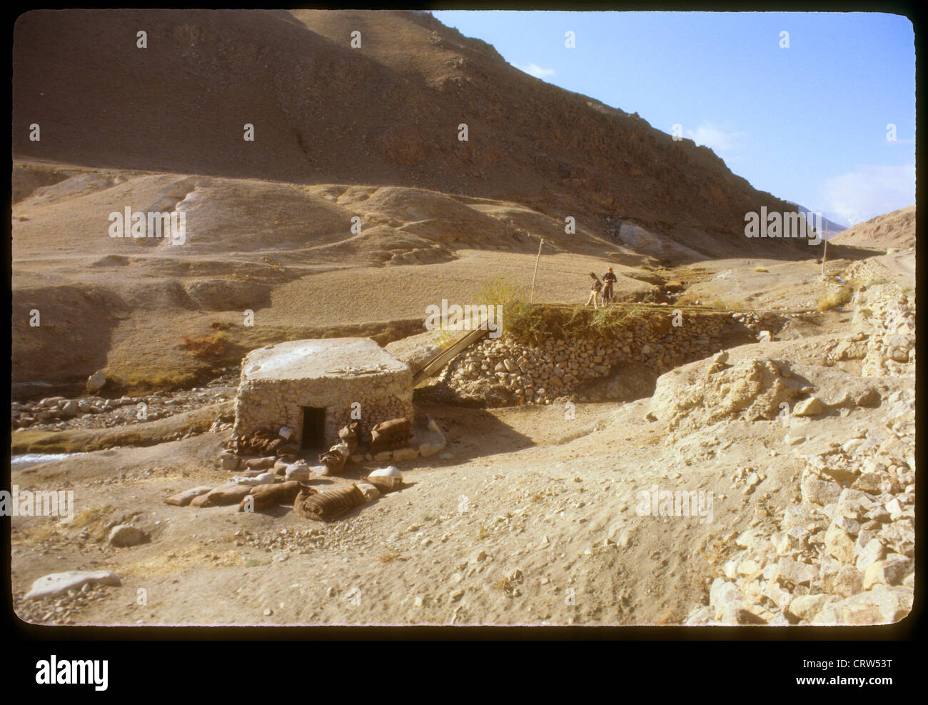 Stone house in afghanistan before the Soviet Invasion Stock Photo - Alamy