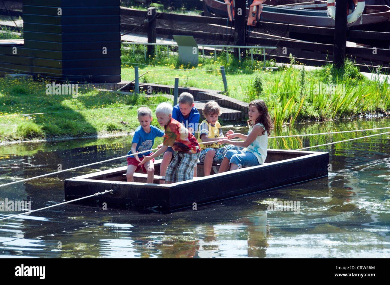Boys boat water hi-res stock photography and images - Alamy