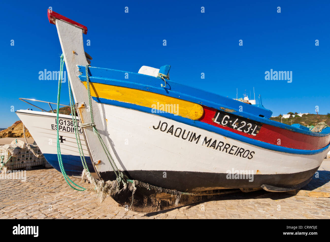 Salema Algarve Portugal Traditionally painted portuguese Fishing boats ...