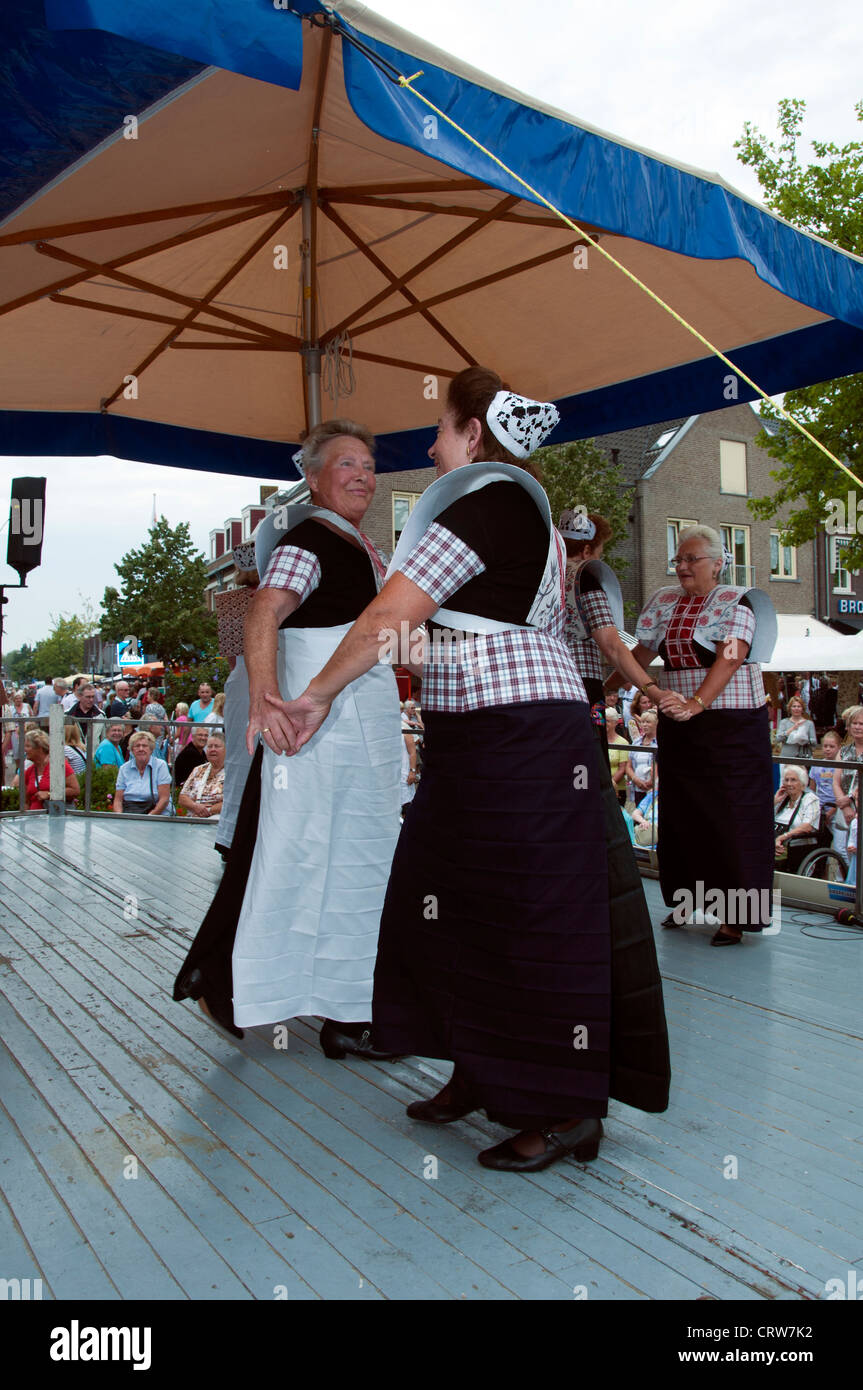 lady in dutch old traditional costumes dancing for tourists Stock Photo ...