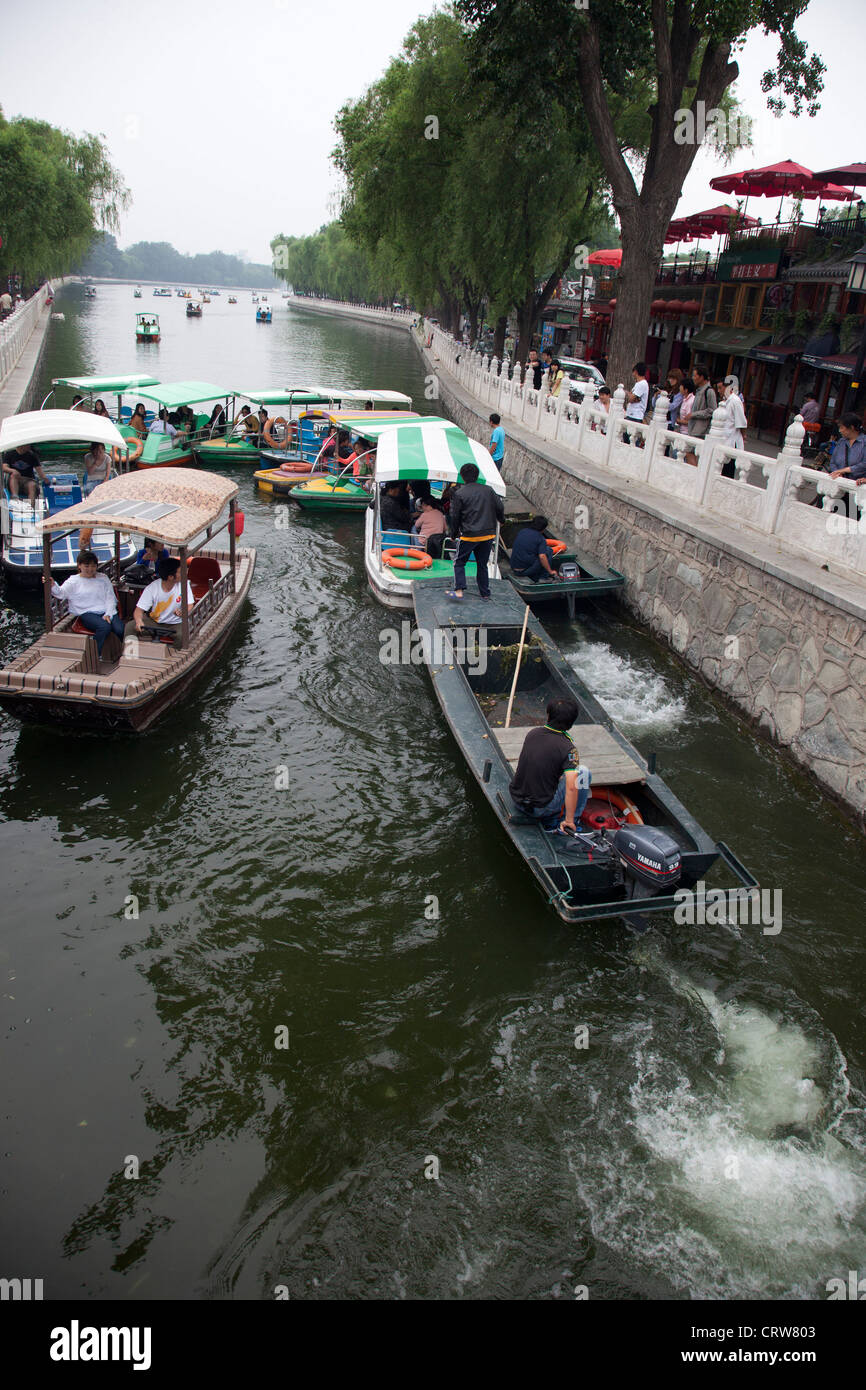 Small boats create a waterway traffic jam on Shichahai lake Beijing ...