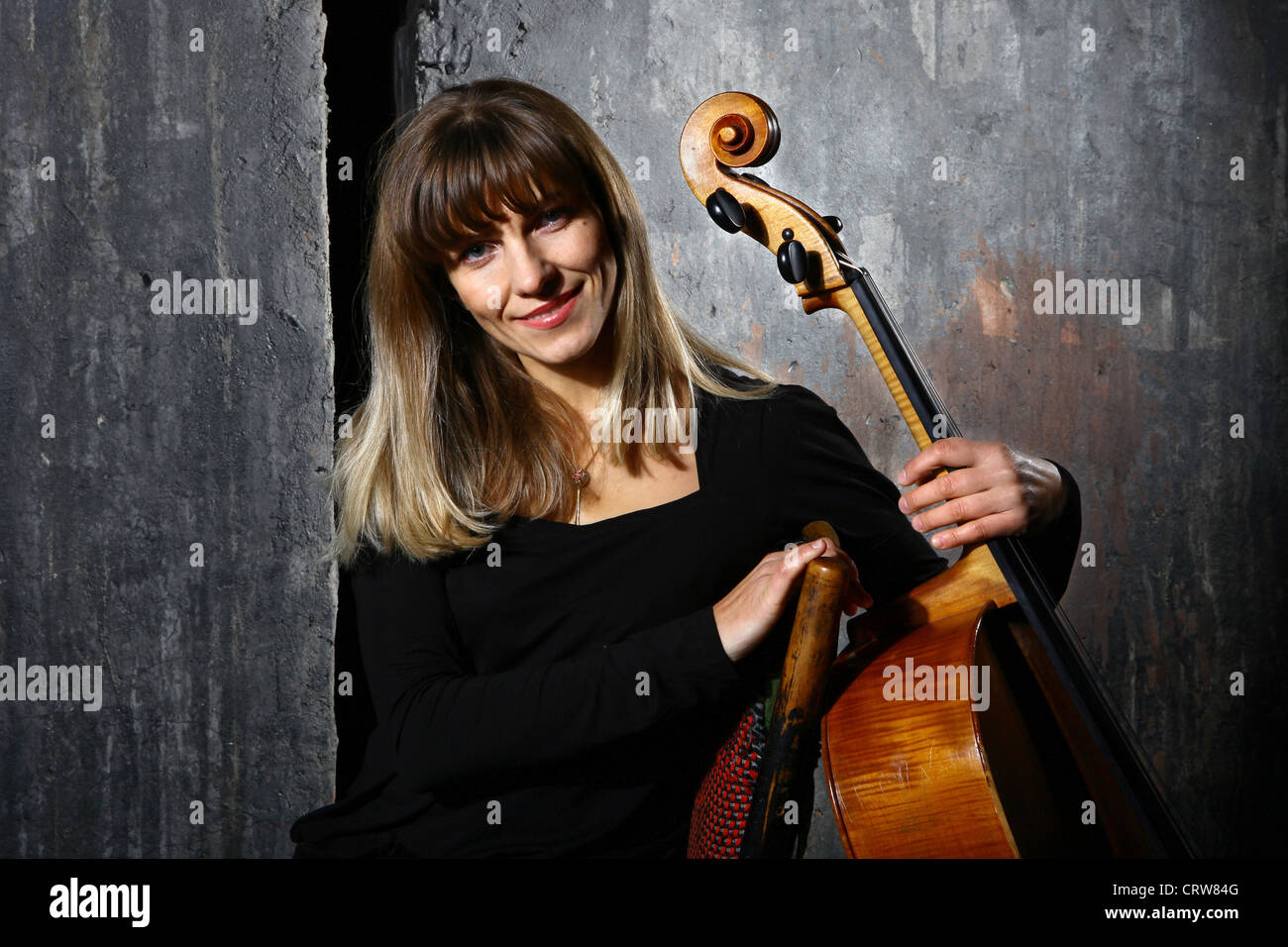 Beautiful cello musician Stock Photo - Alamy