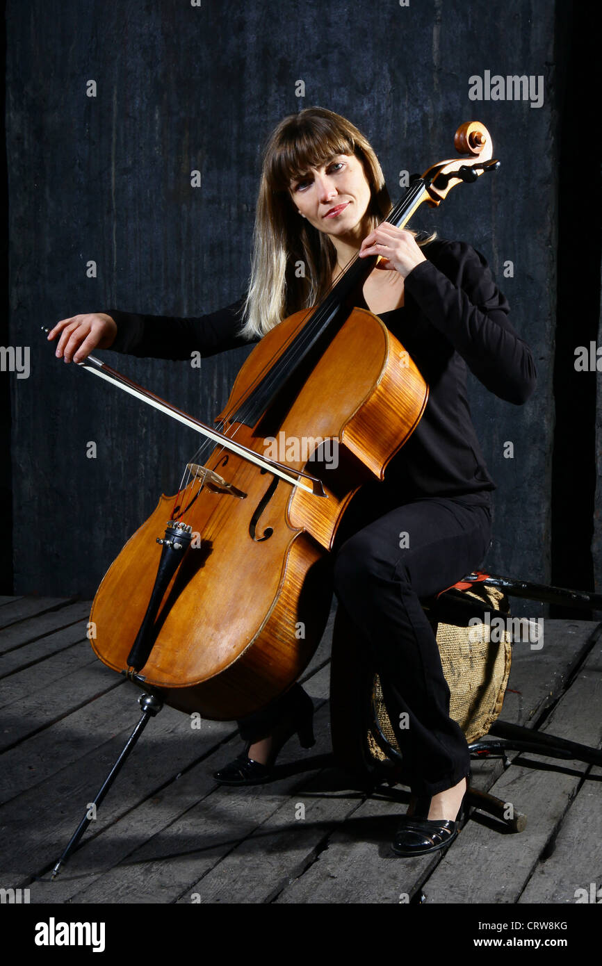 Beautiful cello musician Stock Photo - Alamy