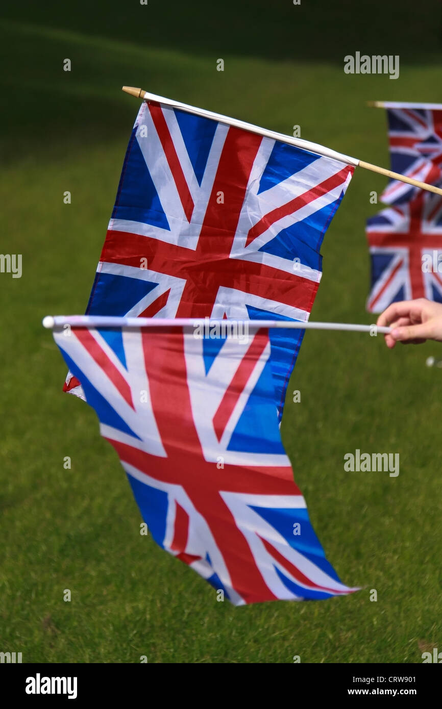 People waving union jack flags hi-res stock photography and images - Alamy
