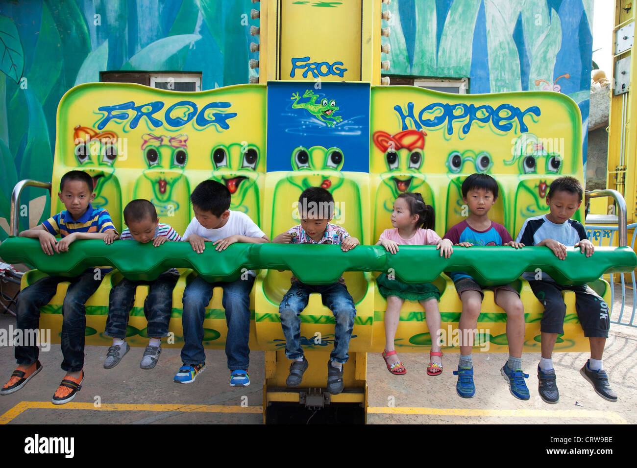 Amusement Park Ride Kids Stock Photos & Amusement Park Ride Kids Stock ...