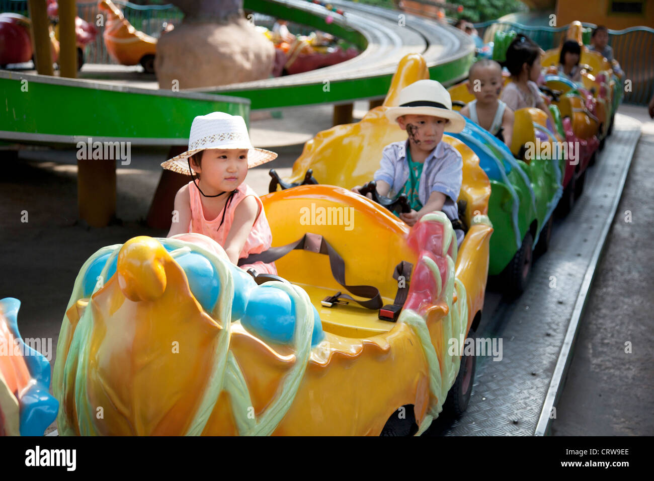 Young children enjoying a gentle ride. Happy Valley Beijing is an ...