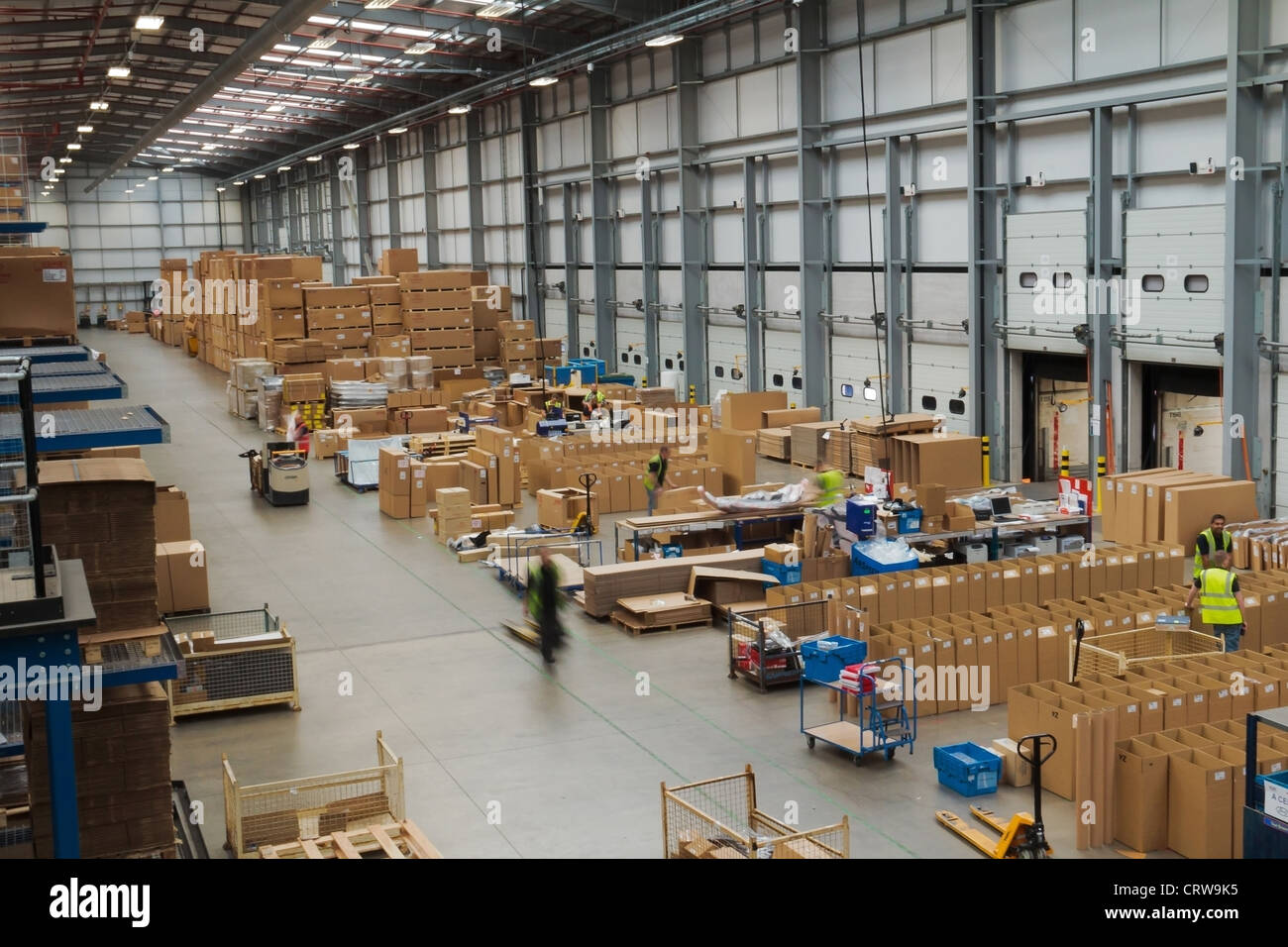 A busy warehouse Stock Photo - Alamy