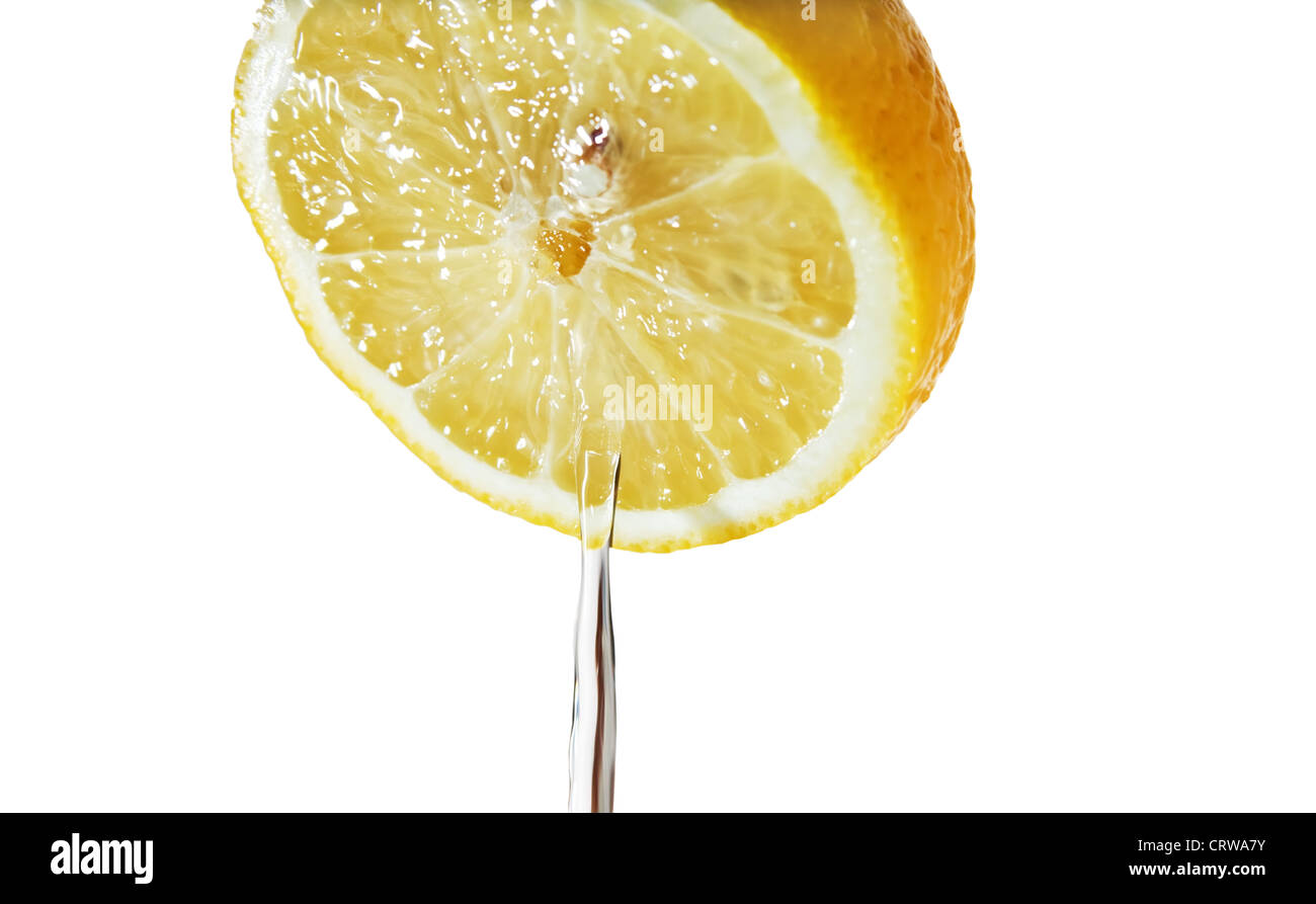 jet juice iflowing from lemon Stock Photo - Alamy