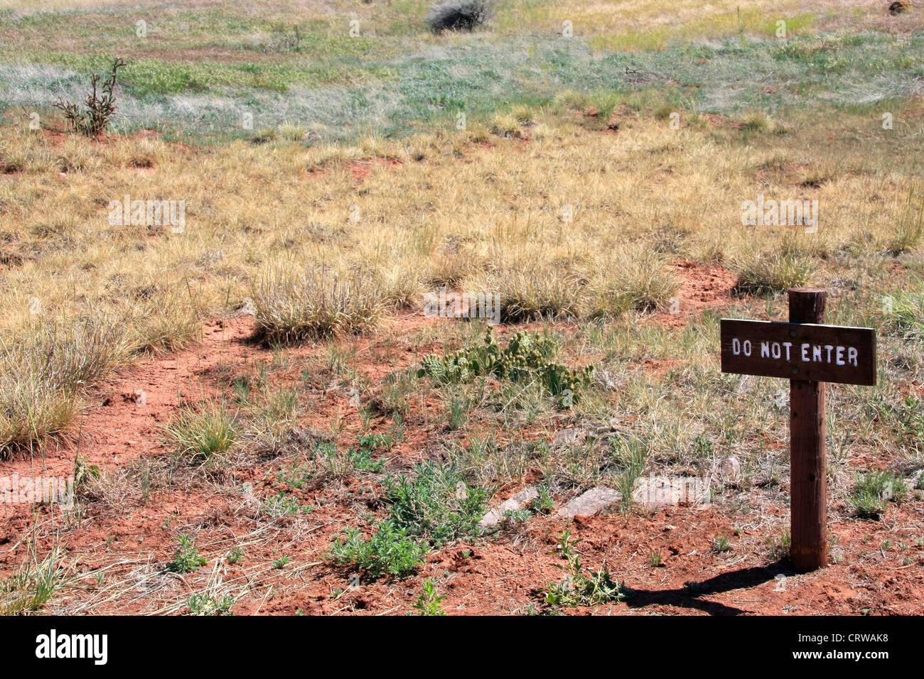 A wooden do not enter sign in the desert Stock Photo - Alamy