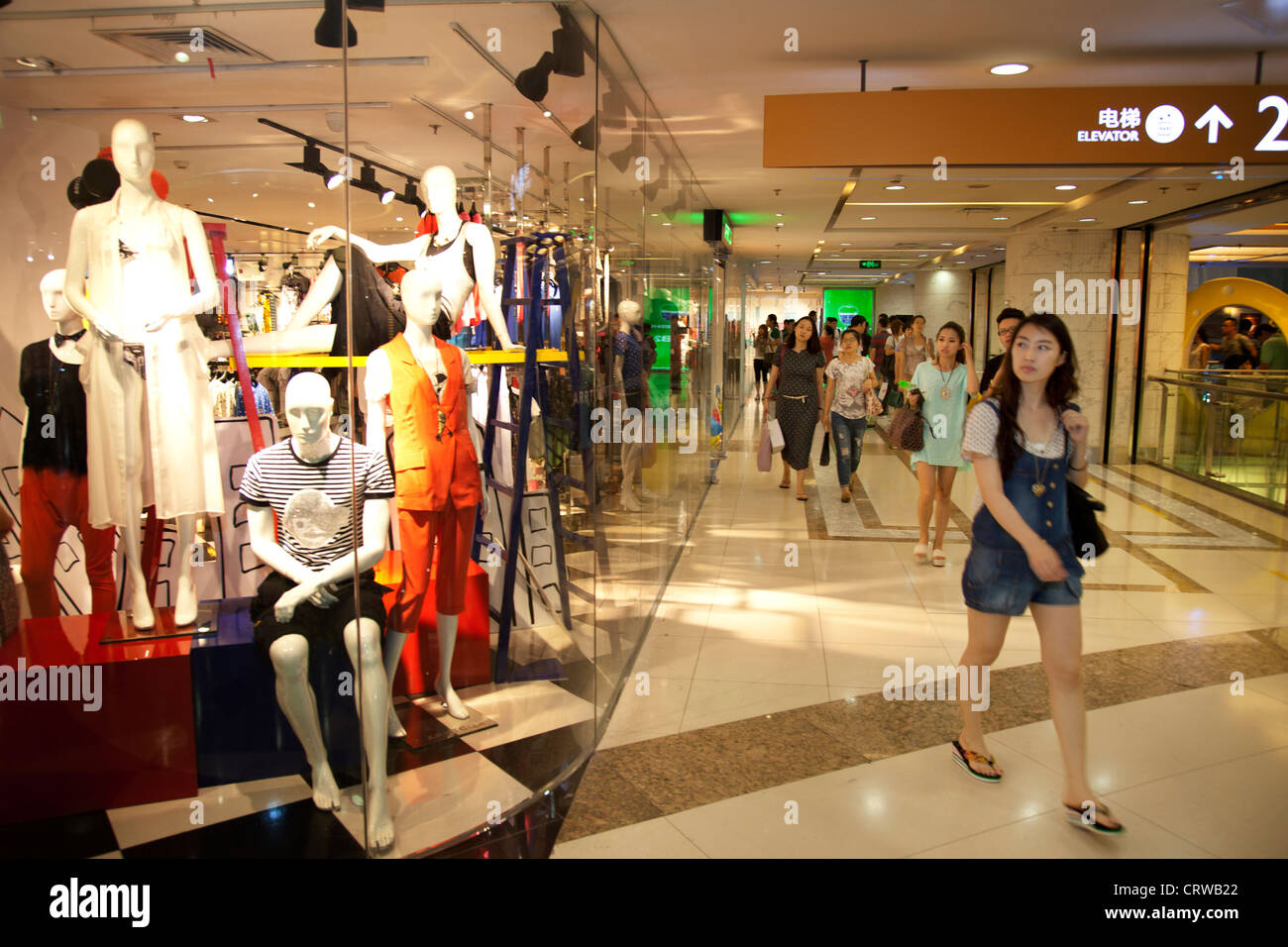 Shoppers at Joy City shopping mall. Xidan is one of the main commercial ...