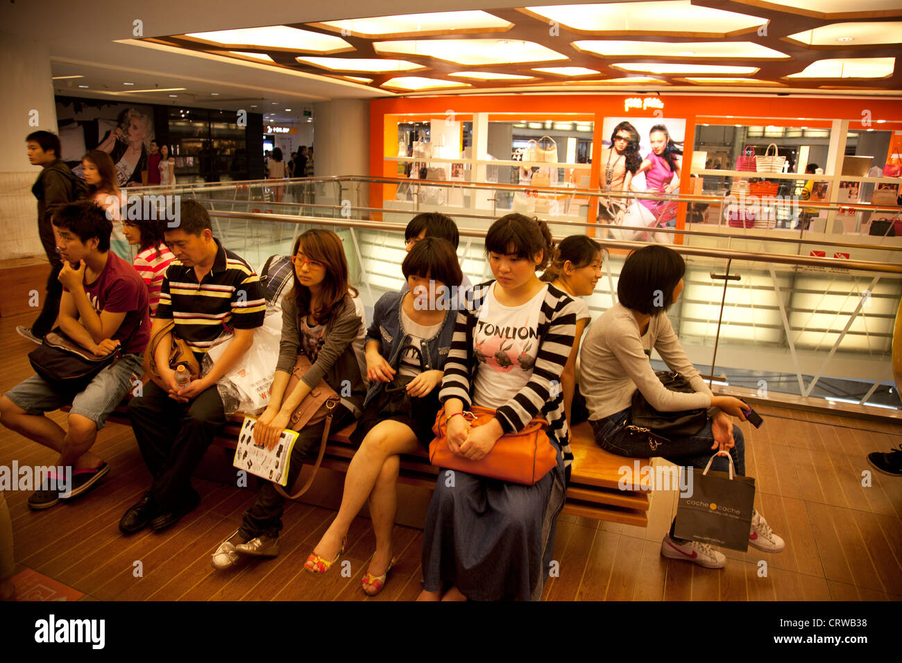 Shoppers at Joy City shopping mall. Xidan is one of the main commercial ...