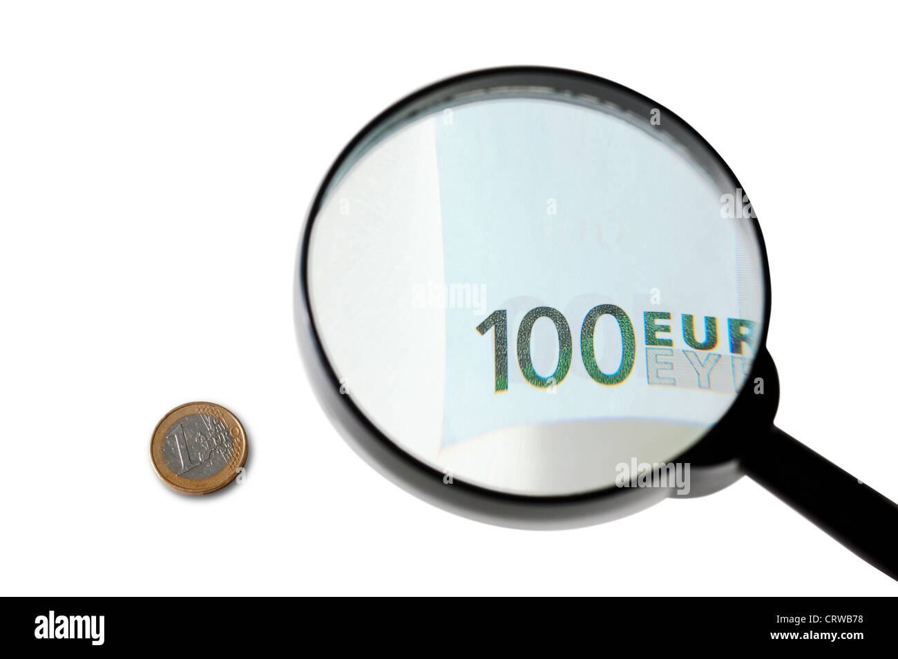 Magnifier glass and money Stock Photo - Alamy
