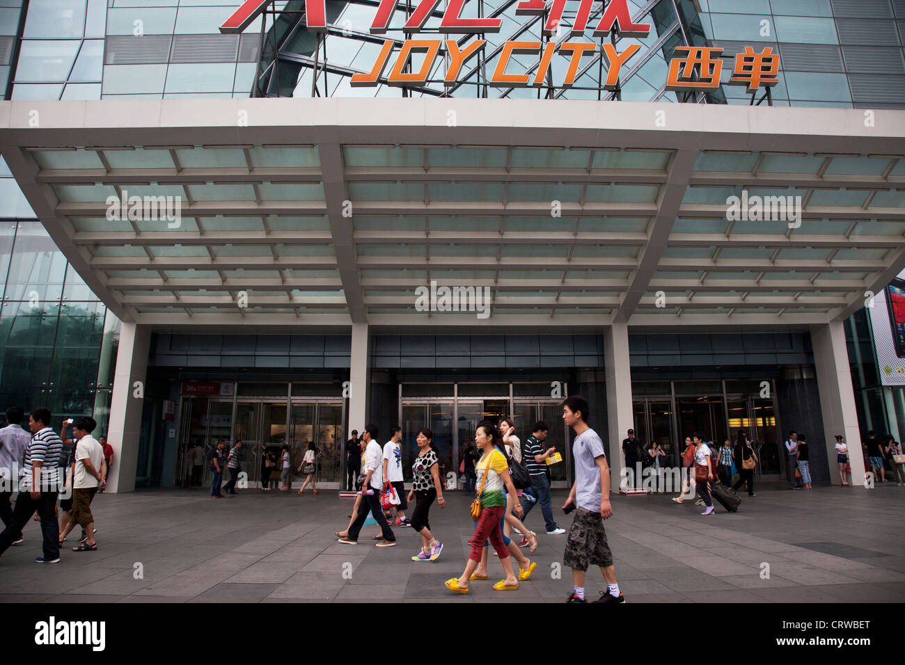 Shoppers outside Joy City shopping mall in Xidan district, one of the ...
