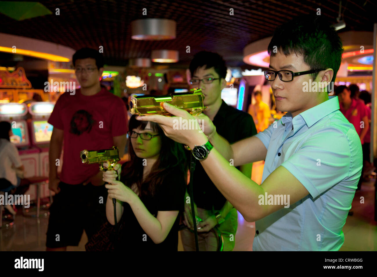 People playing arcade games in arcade china hi-res stock photography ...