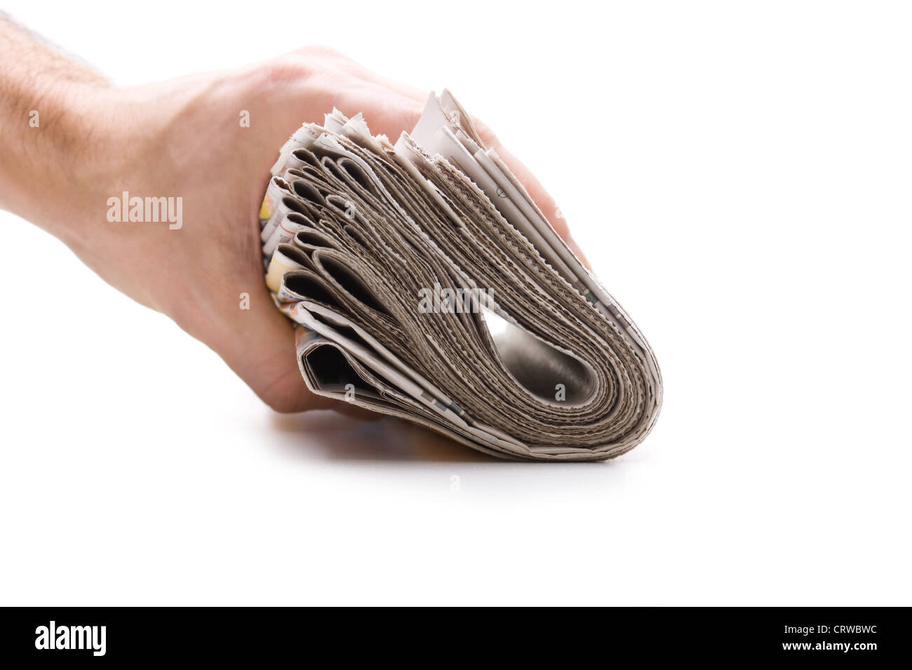 hand holds a bundle of newspapers Stock Photo - Alamy