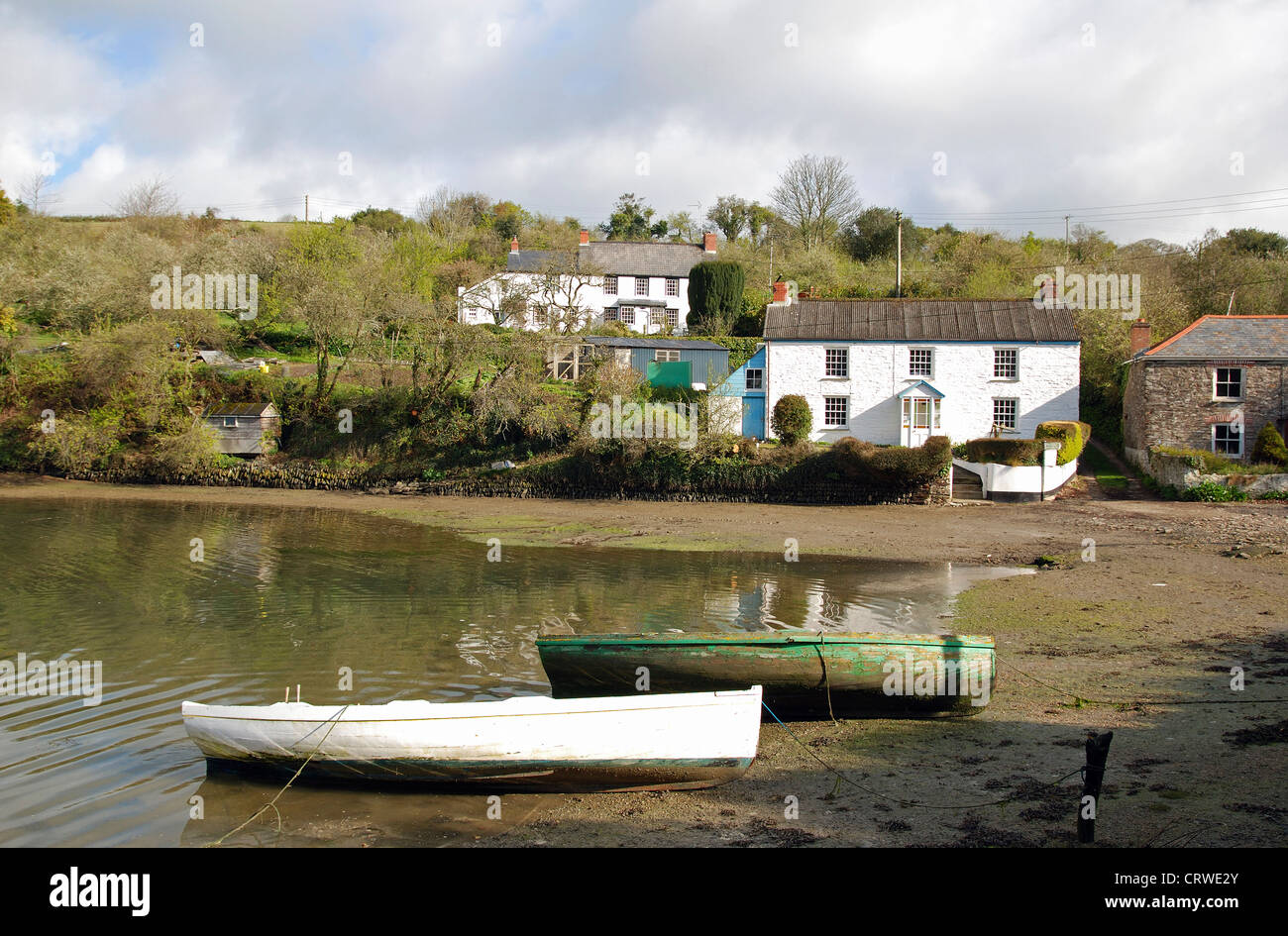 The hamlet of Coombe on a tidal creek off the River Fal near Truro in ...