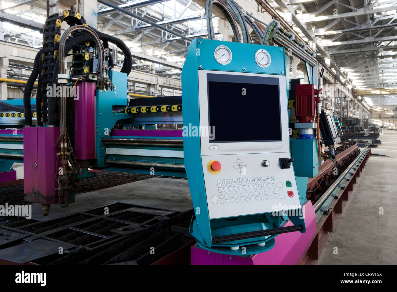 new and powerful metalworking machine Stock Photo - Alamy