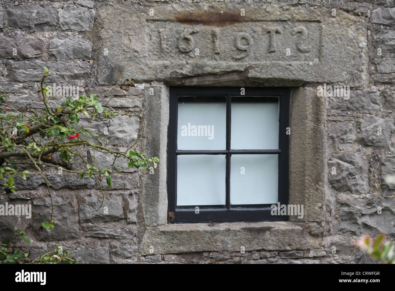 Old Stone Window in Derbyshire with a Lintel Dated 1619 Stock Photo - Alamy