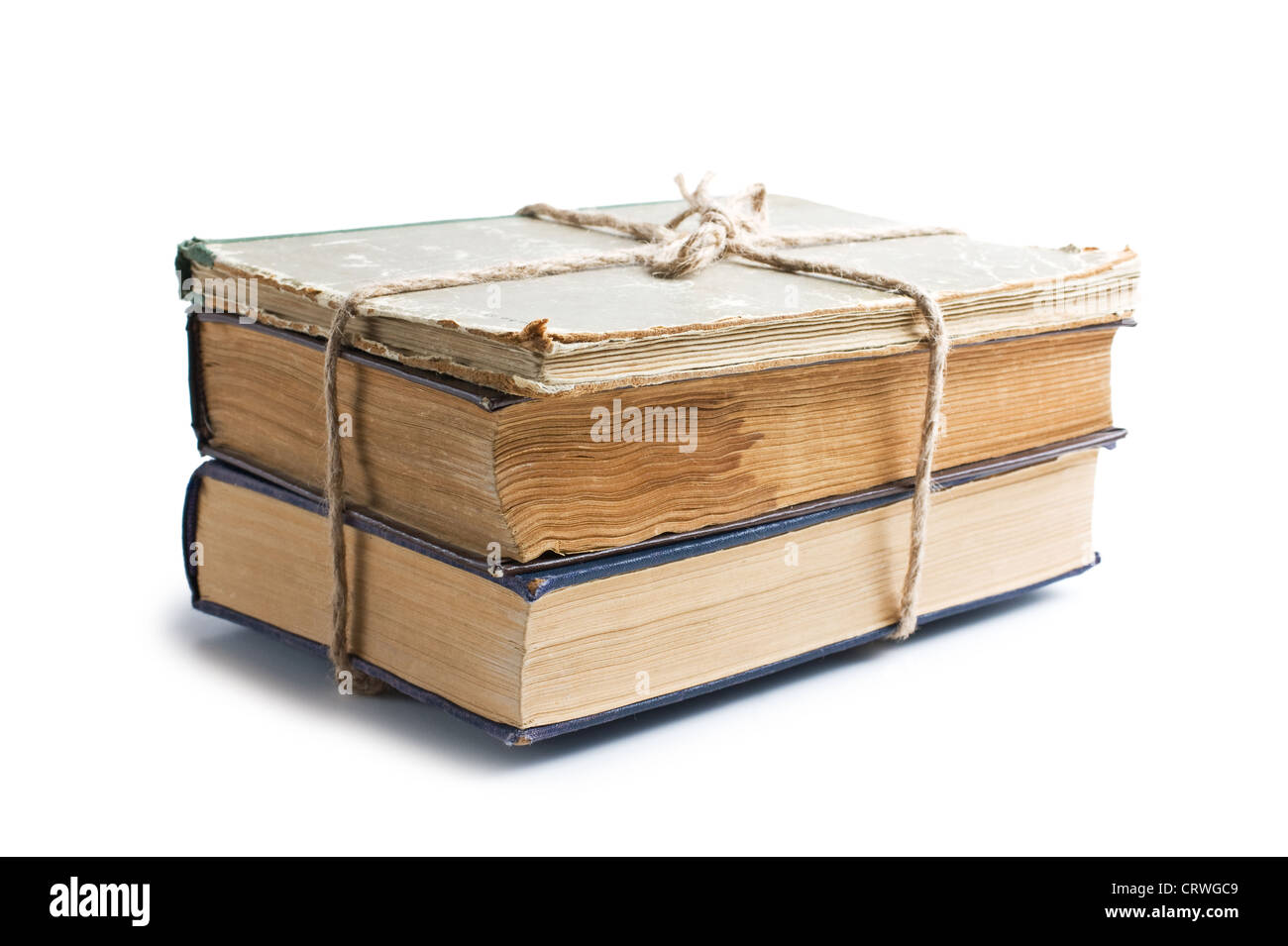 stack of old books tied with rope Stock Photo - Alamy