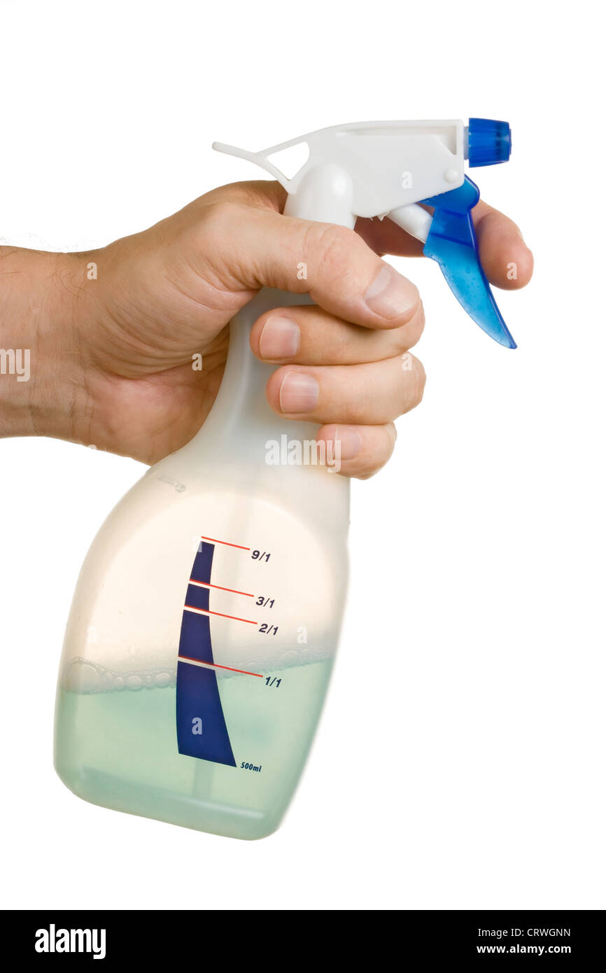 Hand with spray bottle Stock Photo - Alamy