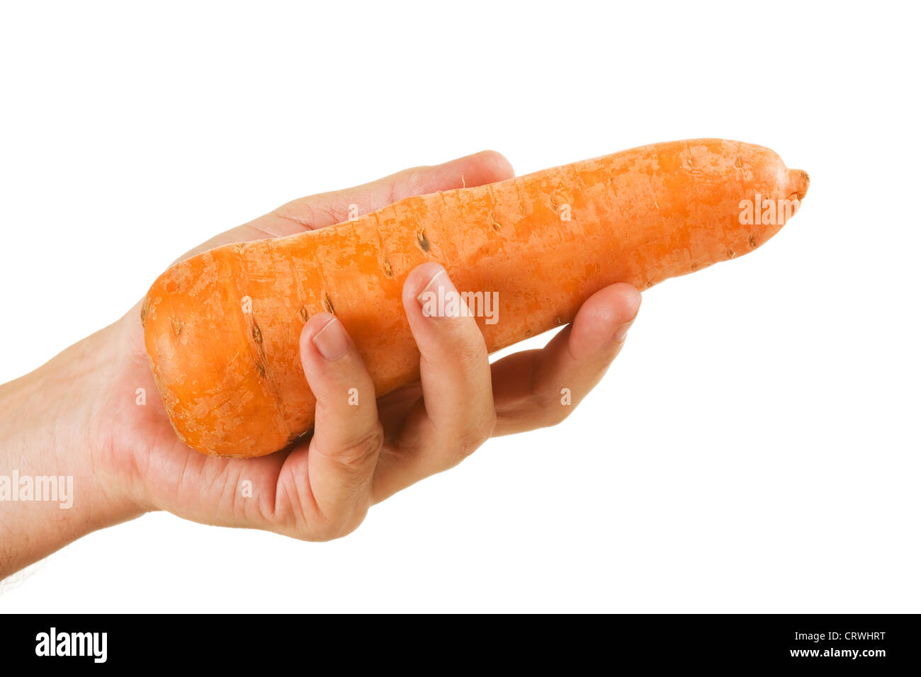 carrot in hand Stock Photo - Alamy