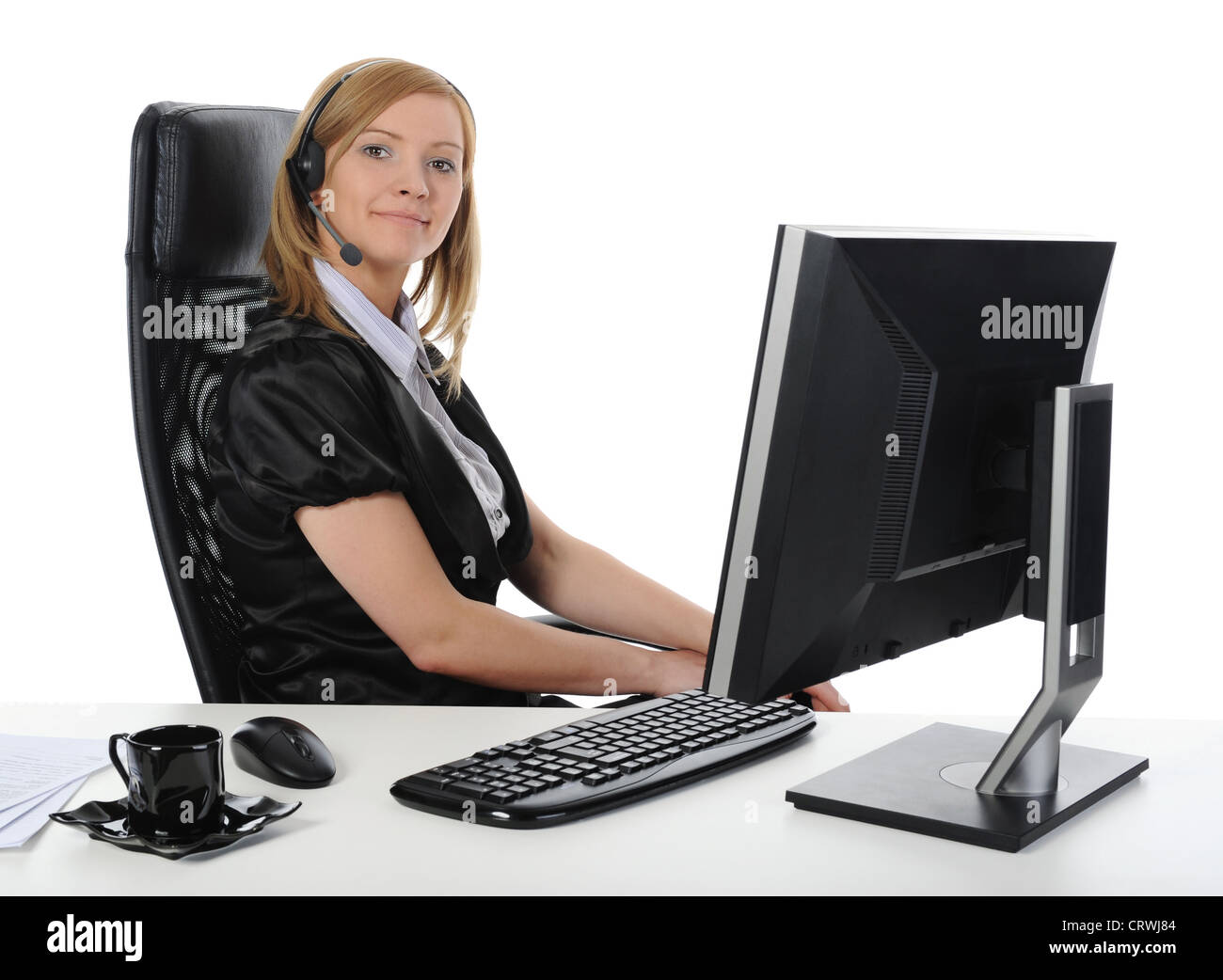 Beautiful girl operator at the computer Stock Photo - Alamy
