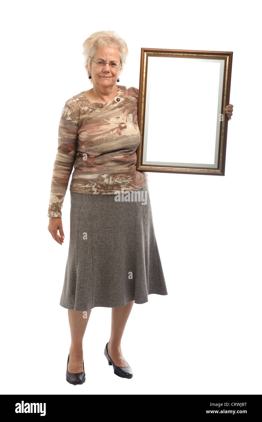 Middle aged woman holding blank picture frame Stock Photo - Alamy