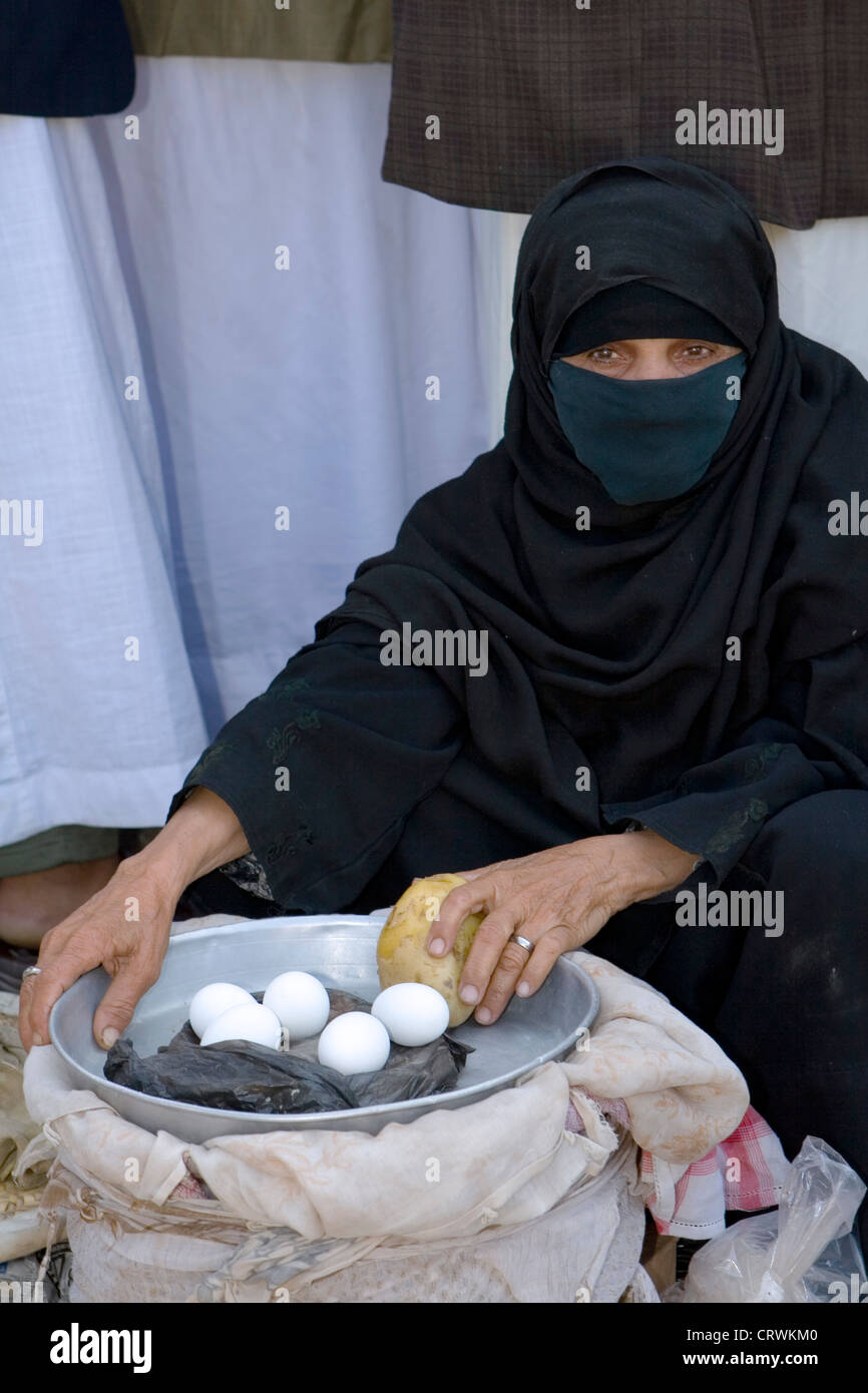 Woman selling eggs at a street market, Haraz Mountains, Manarkha, Al ...
