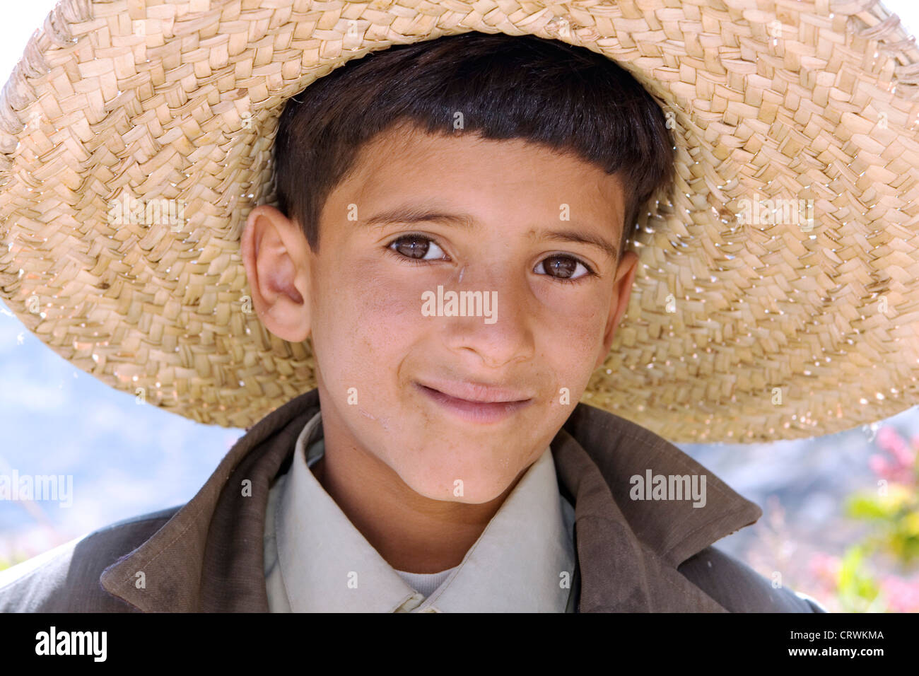 Boy With A Straw Hat High Resolution Stock Photography and Images - Alamy