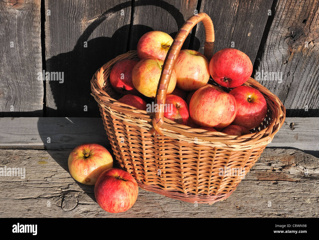 Basket with apples Stock Photo - Alamy
