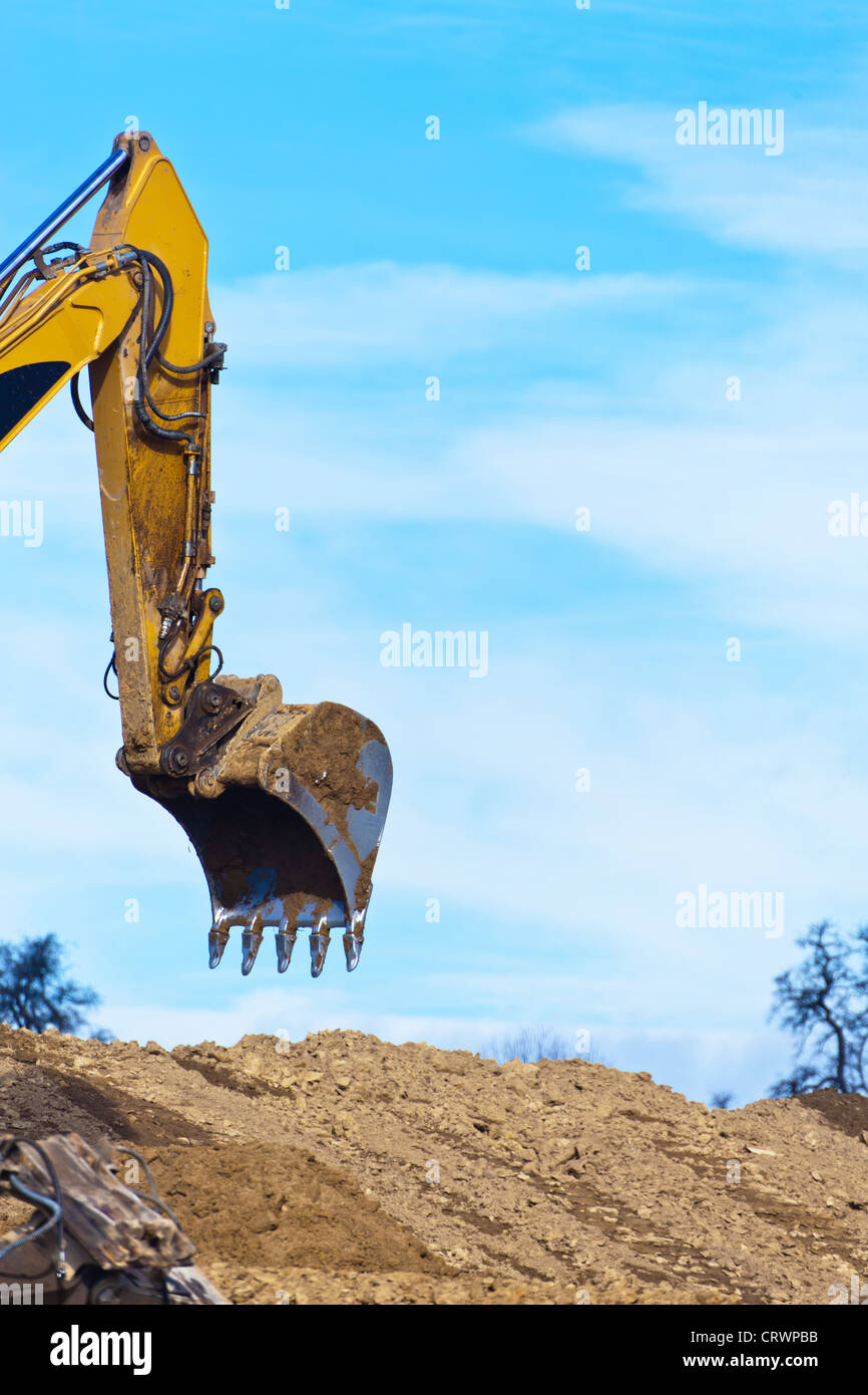 Excavator at construction work on site Stock Photo - Alamy