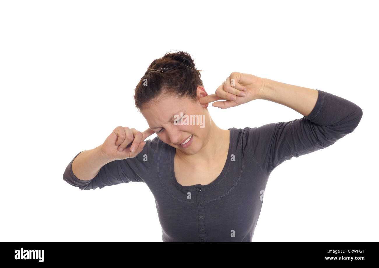 young woman holding her ears to Stock Photo - Alamy