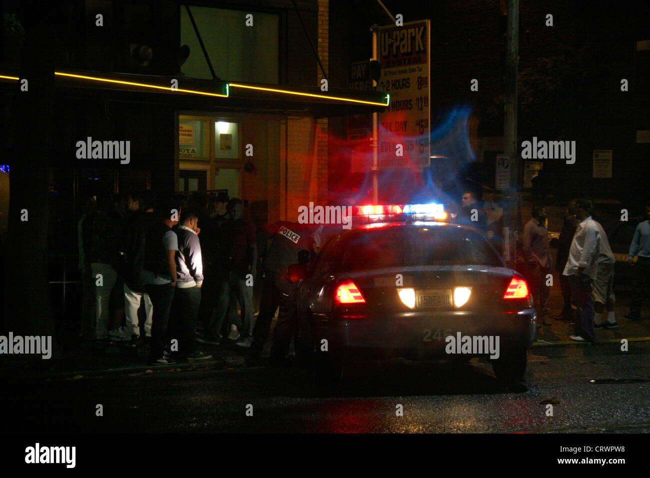 Seattle police respond to a call in Belltown, in the rain Stock Photo ...