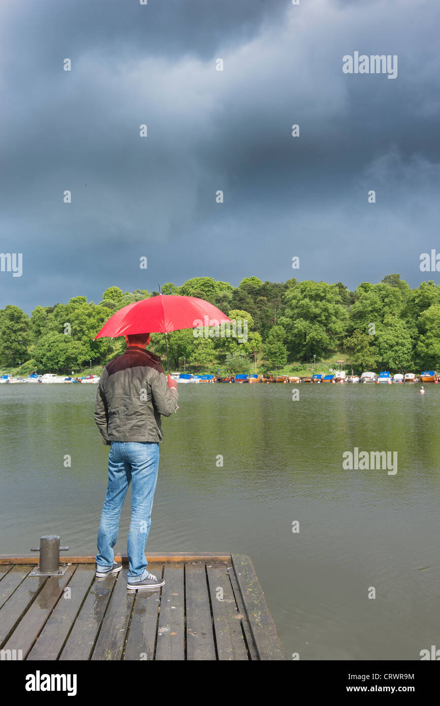Person standing lake watching hi-res stock photography and images - Alamy