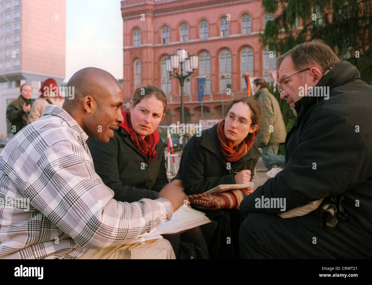 A colored student discusses with his professor Stock Photo - Alamy