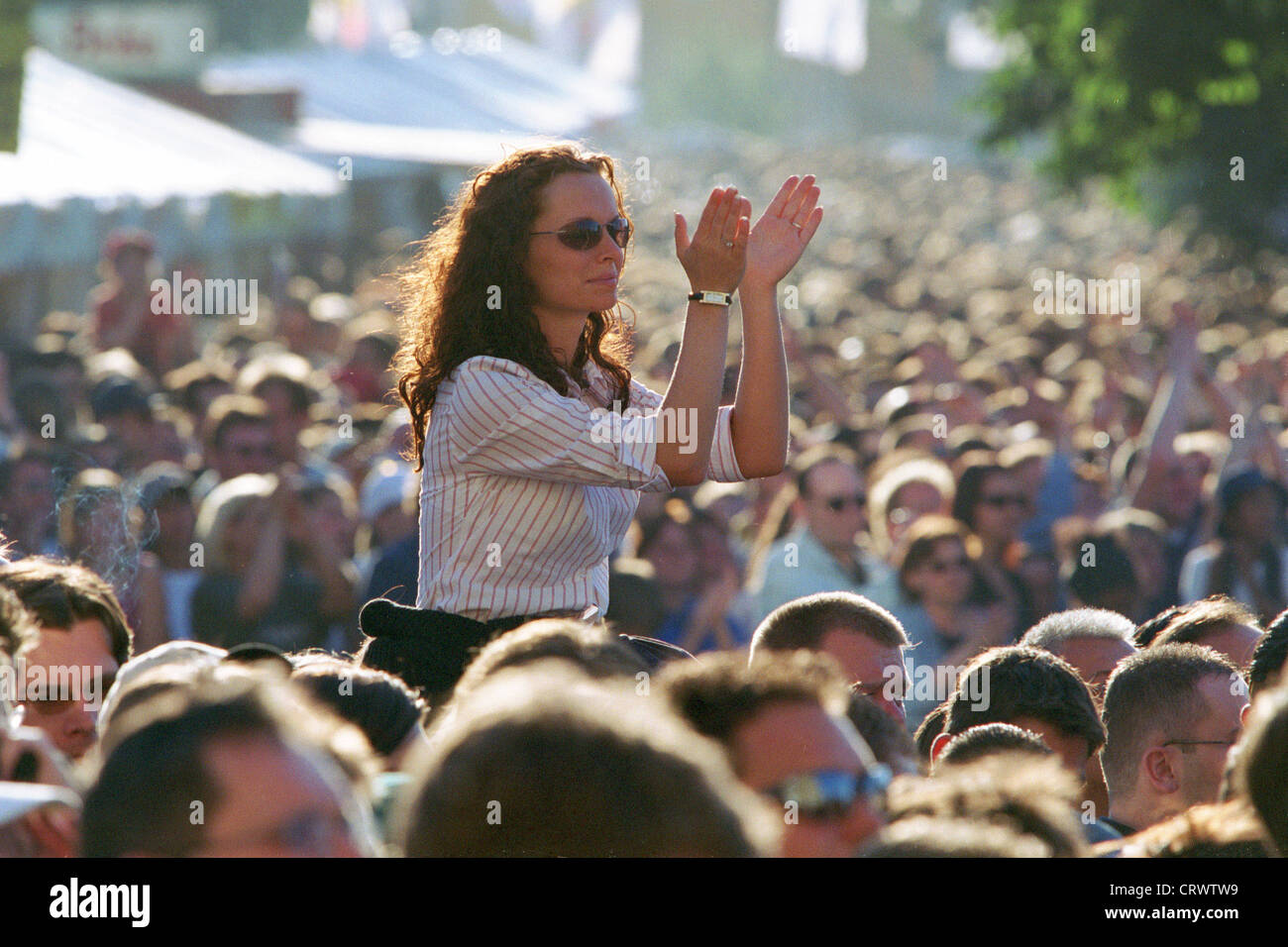 Fans at a concert Stock Photo - Alamy