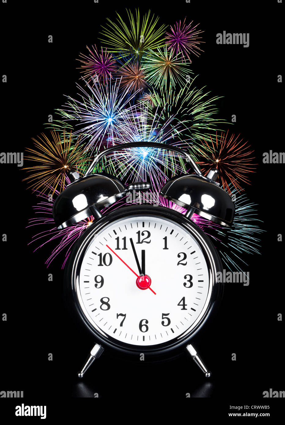 alarm clock at high time with fireworks on black background Stock Photo ...