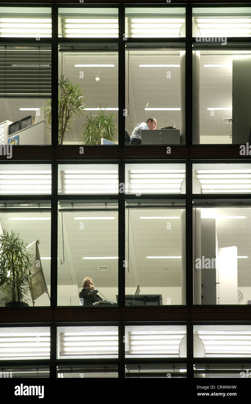 Glowing window in an office building in Berlin Stock Photo - Alamy