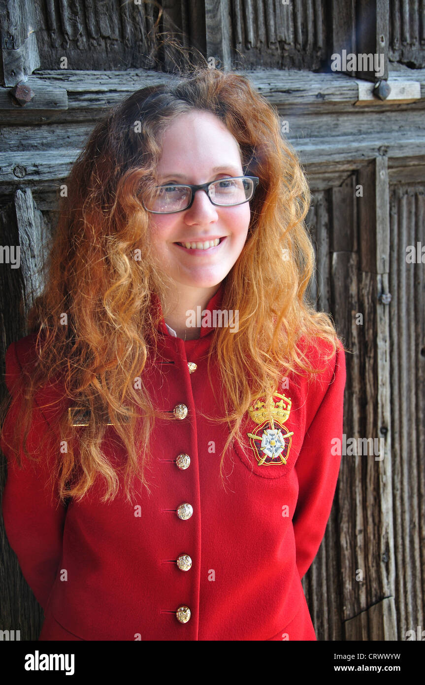 Young female guide at Hampton Court Palace, London Borough of Richmond ...