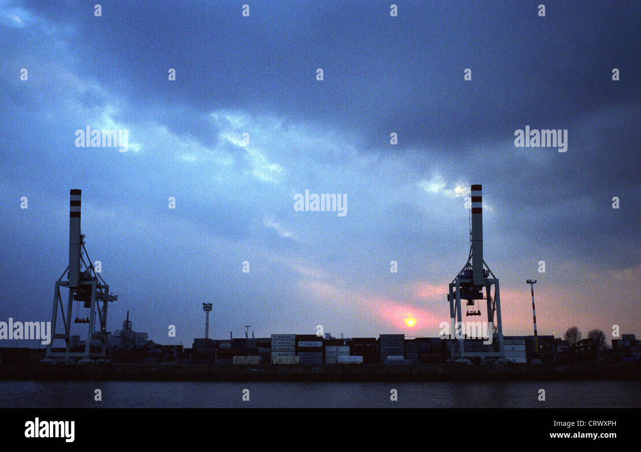 Container port in Sunset Stock Photo - Alamy