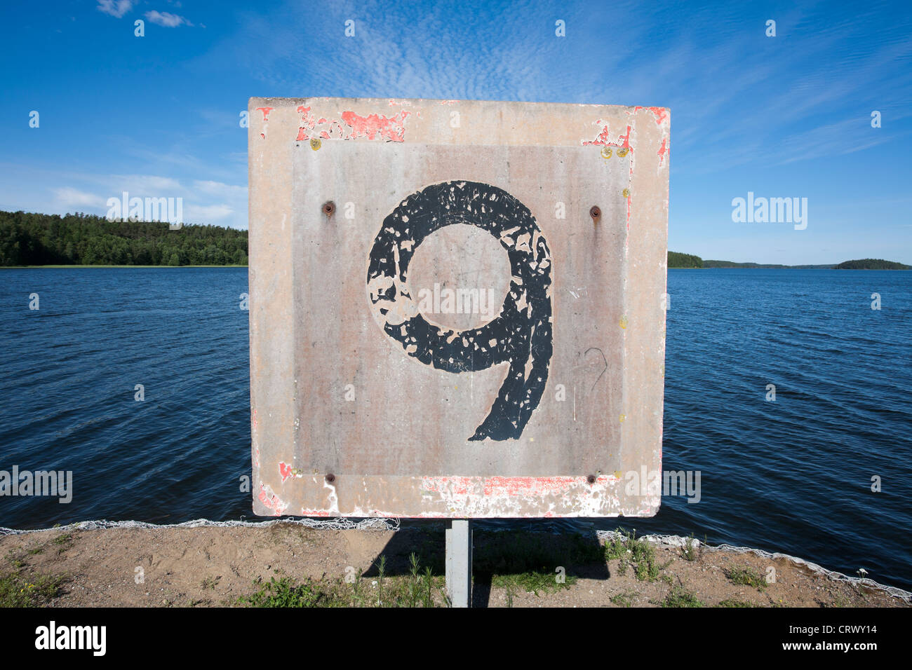 weathered old speed limit sign at harbour Stock Photo - Alamy