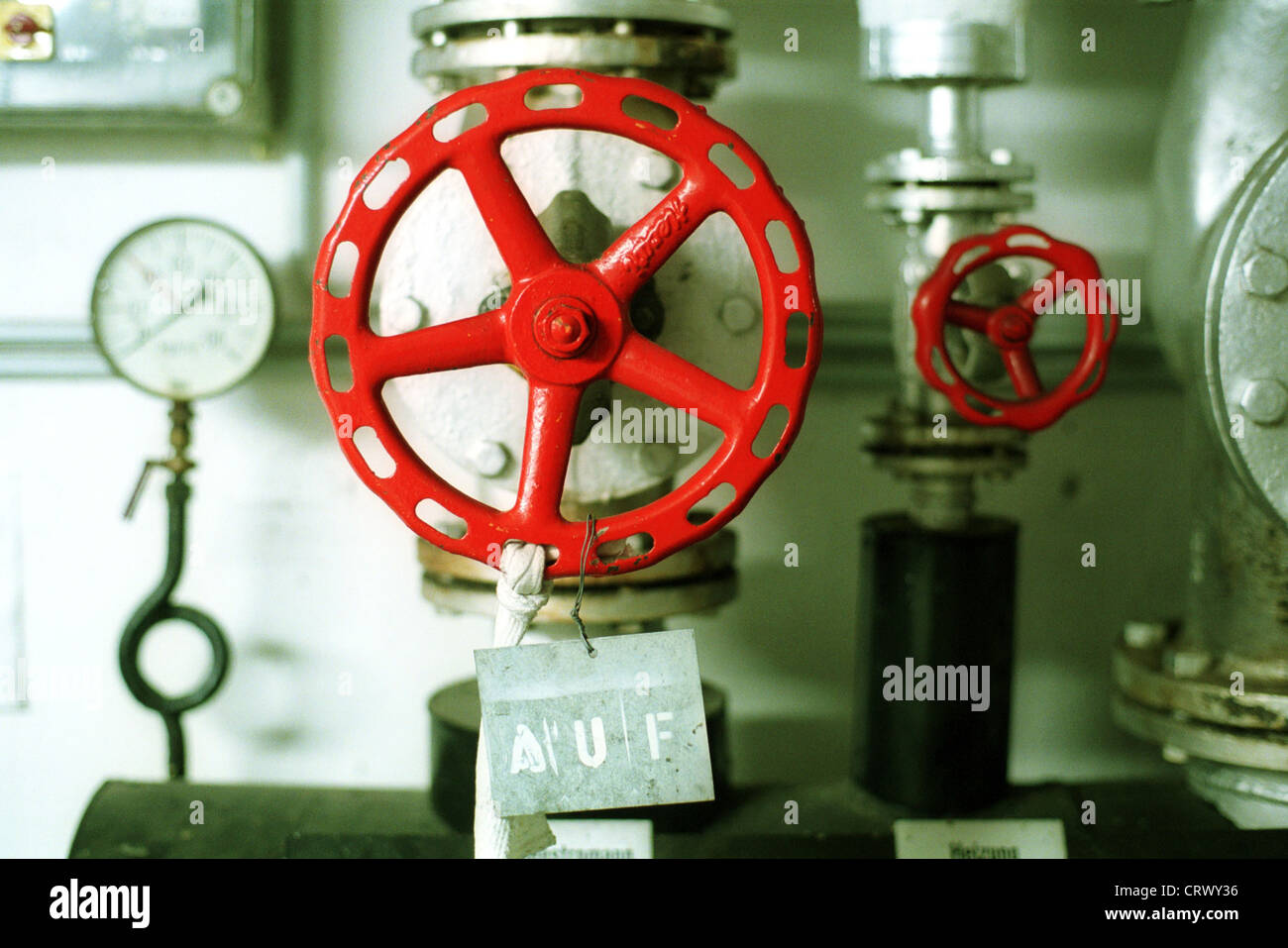 Red valve in indoor Stock Photo - Alamy