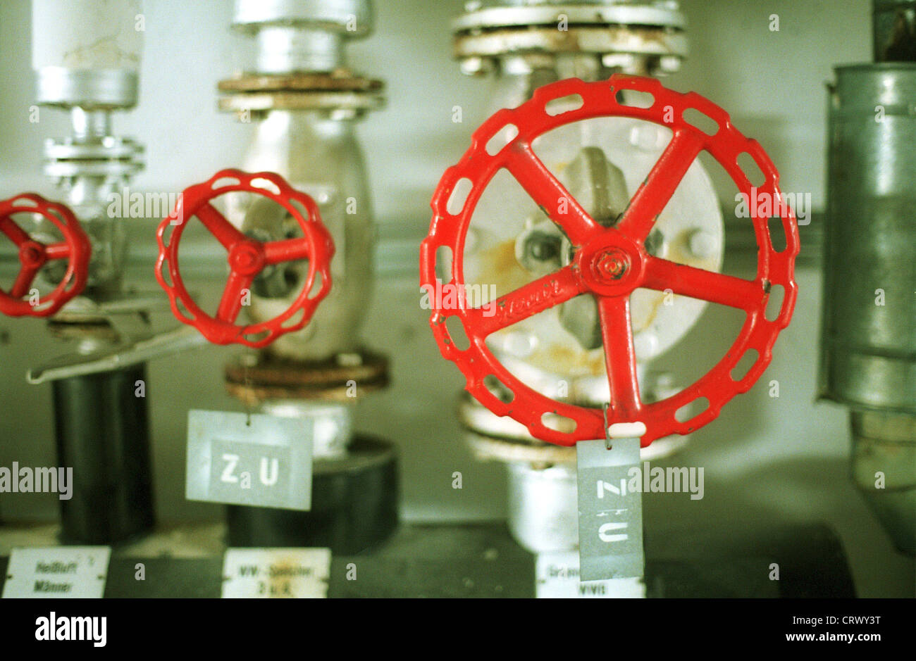 Red valve in indoor Stock Photo - Alamy