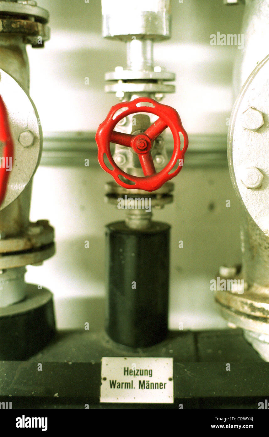 Red valve in indoor Stock Photo - Alamy