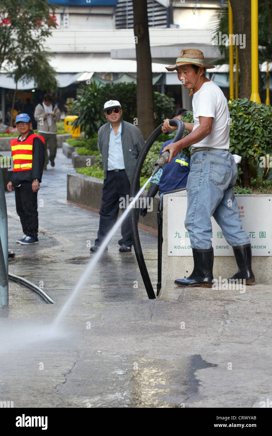 Cleaning streets hi-res stock photography and images - Alamy