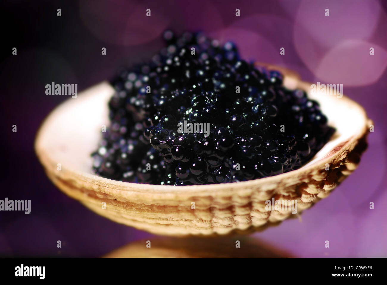 Black caviar - symbol of wealth Stock Photo - Alamy