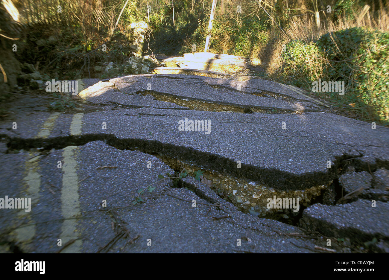 broken tarmac road due to cliff erosion, Blackgang, Isle of Wight Stock ...