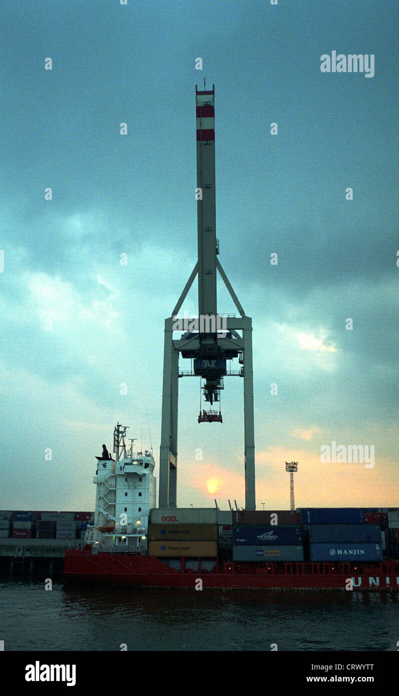 Containerbruecke in sunset Stock Photo - Alamy