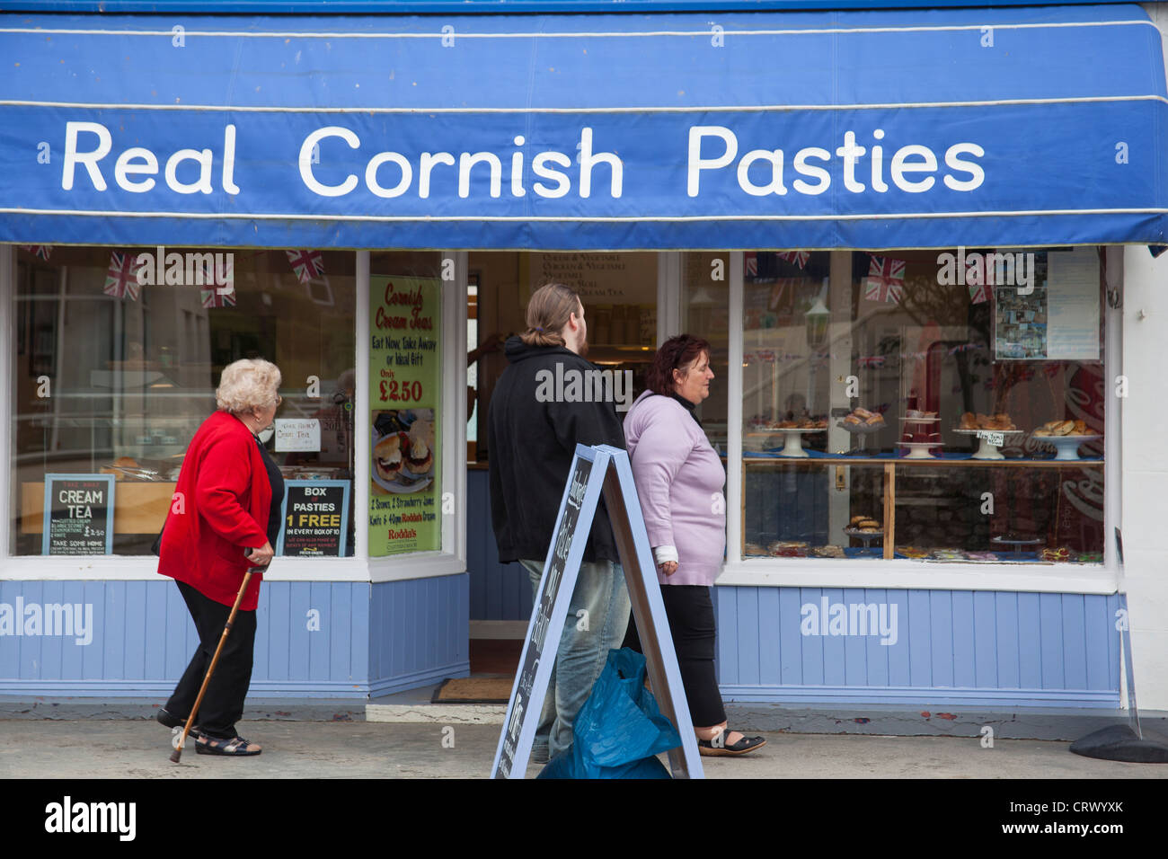 Cornish Pasty shop with members of the public walking by Stock Photo ...